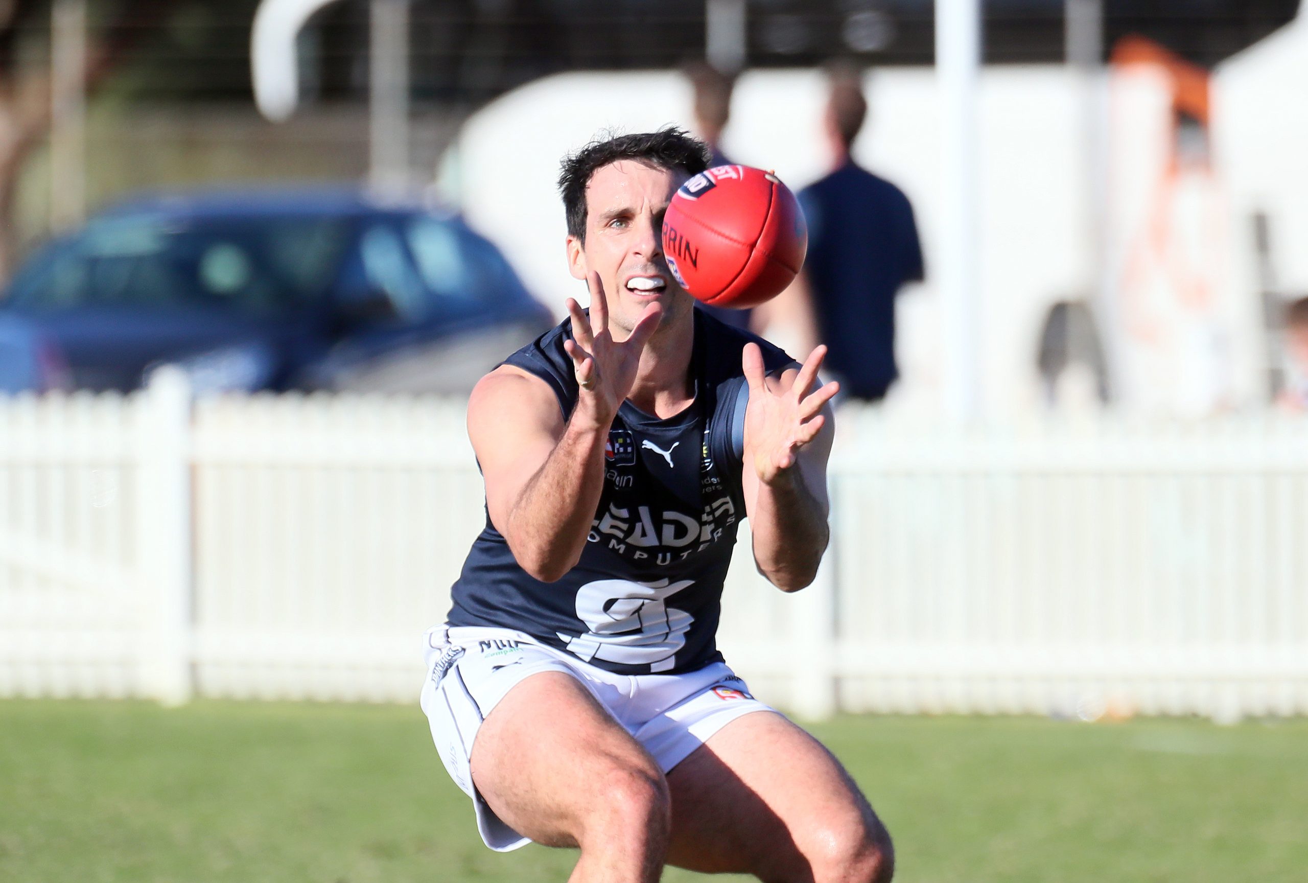 Summerton smiling at his milestone opponents - SANFL